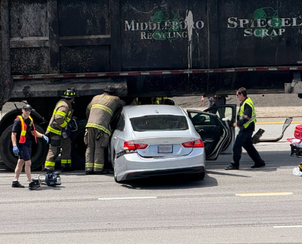 Car trapped under tractor trailer on I-95 North in Providence, RI